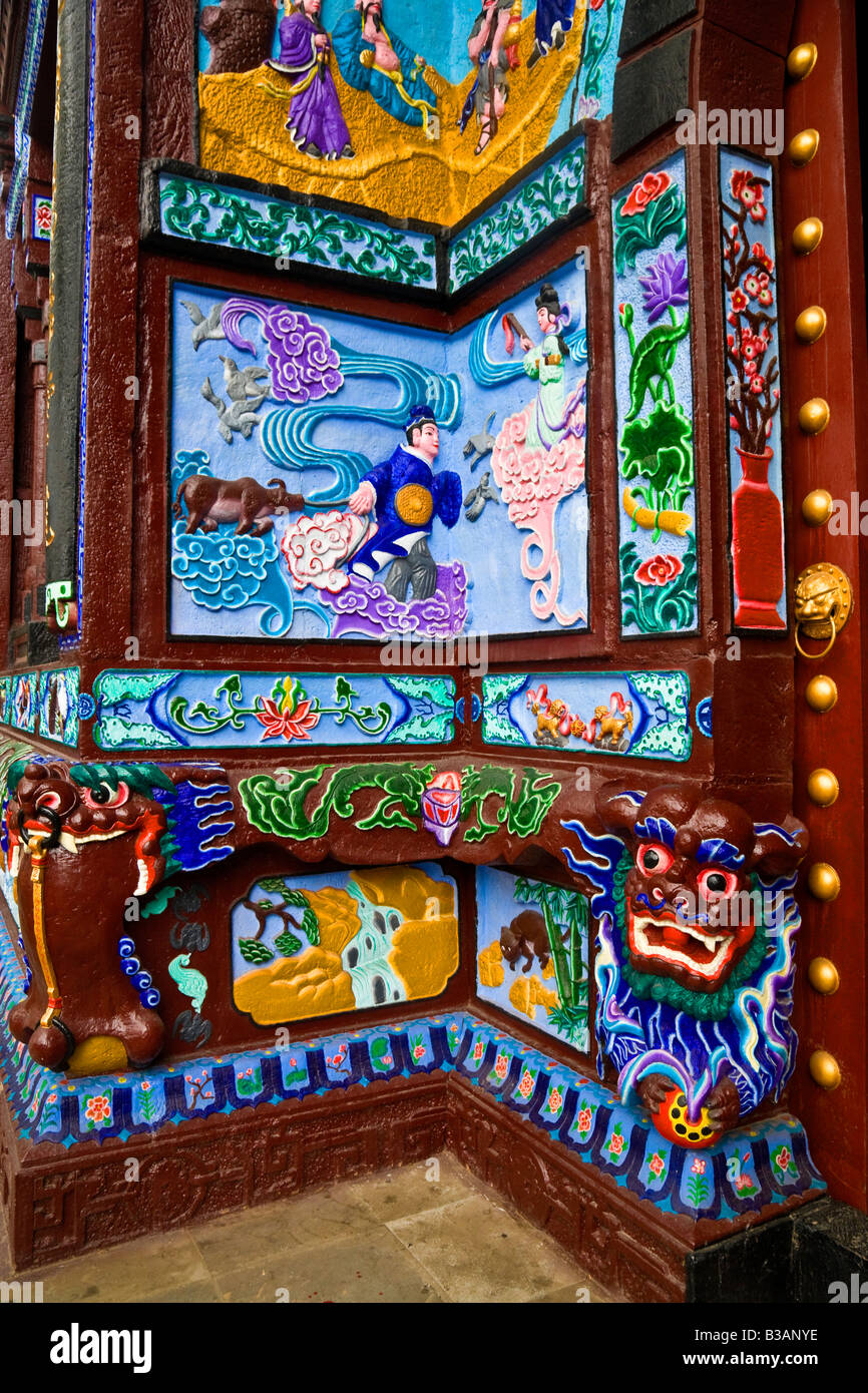 Carved and painted wall at Shangqing Gong Daoist temple on Qingcheng ...