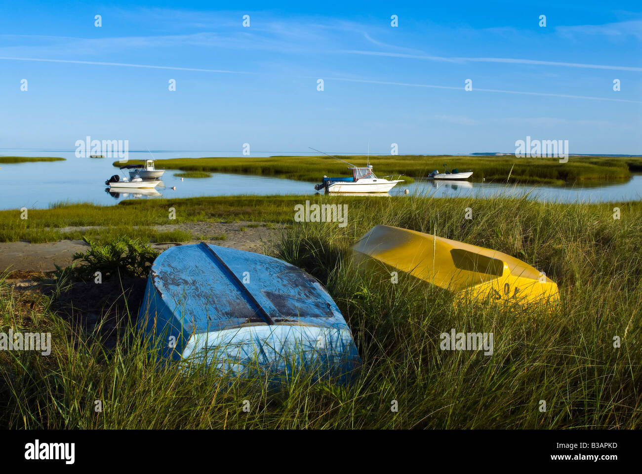 Beached rowboats and anchored boats in Cape Cod Bay, Orleans, Cape Cod ...