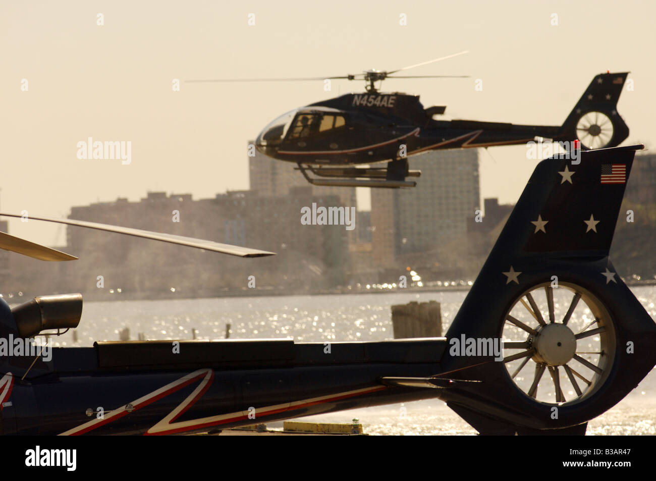 Helicopters flying over New York Stock Photo - Alamy