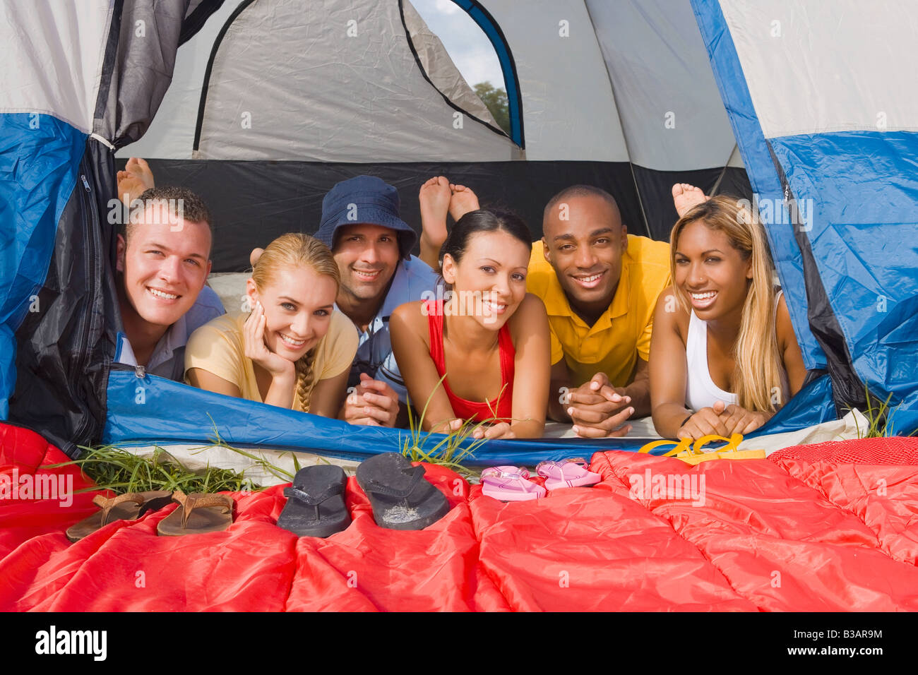 Couple camping laying in tent hi-res stock photography and images - Alamy