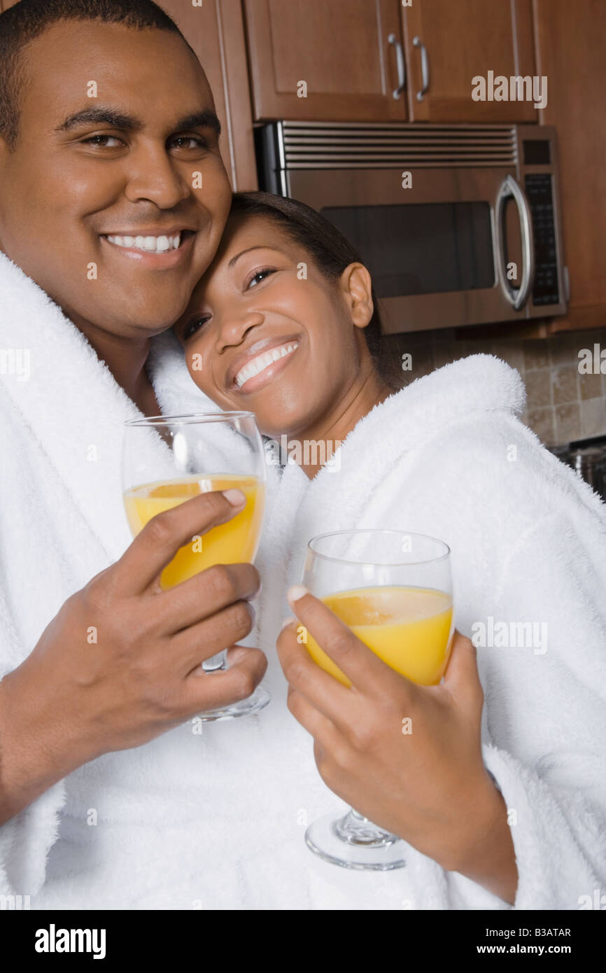 African couple hugging Stock Photo - Alamy