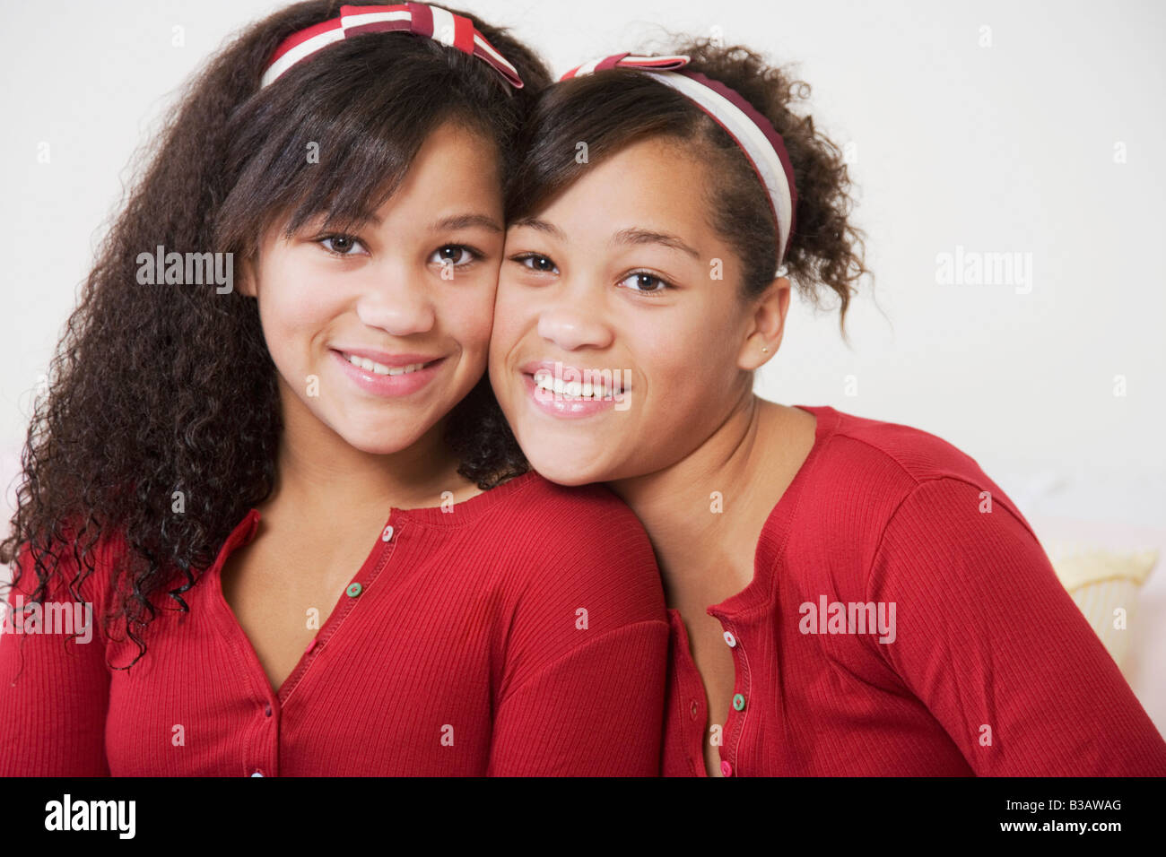 African twin sisters hugging hi-res stock photography and images - Alamy