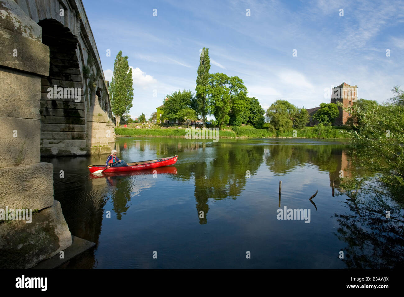 Mytton and Mermaid Hotel Atcham Church canoeist paddling on the River ...