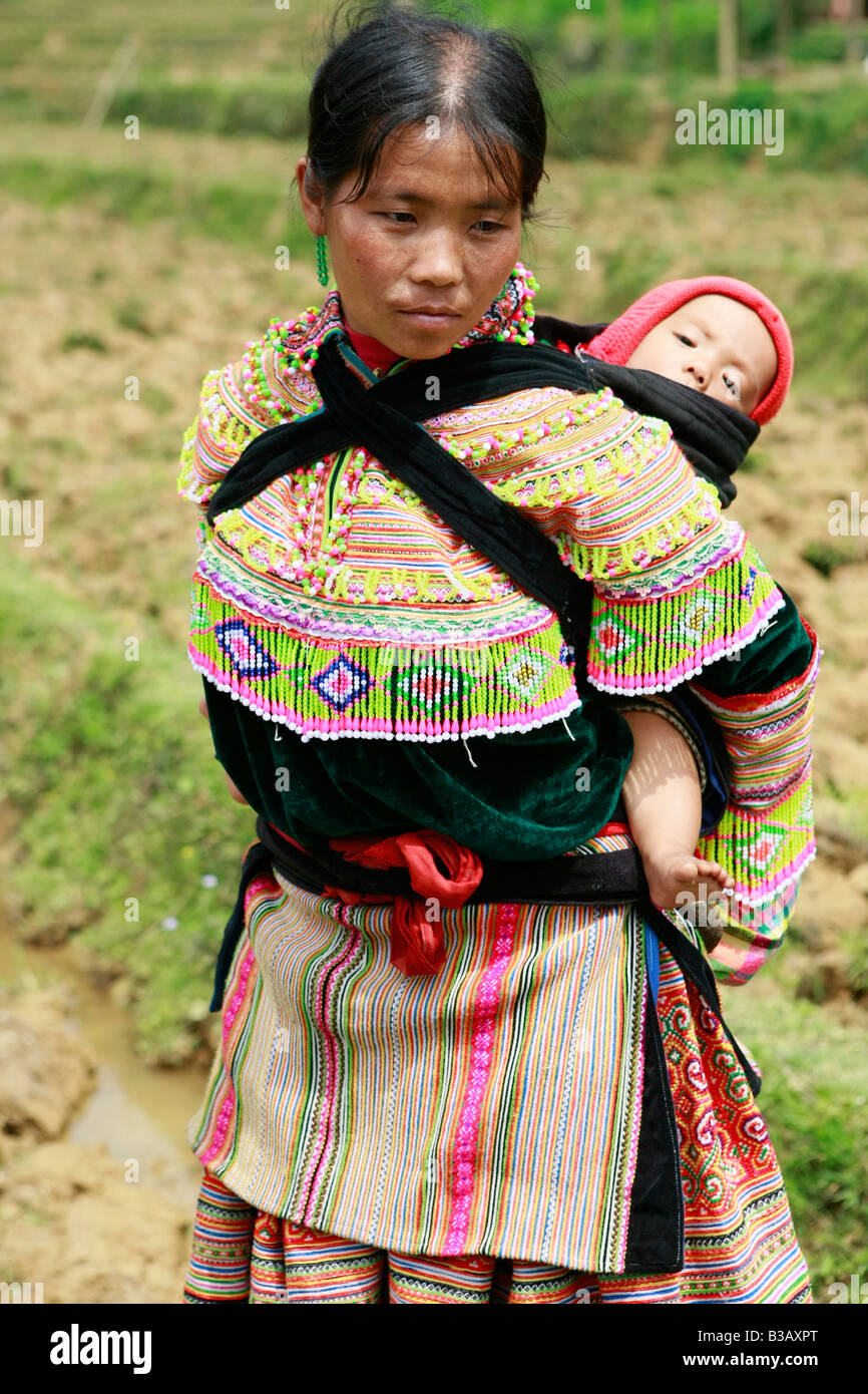 Flower Hmong tribeswoman and child at a village near Bac Ha, Vietnam ...
