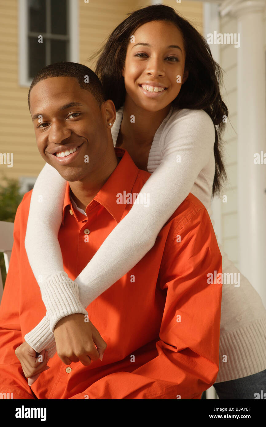 African couple hugging Stock Photo - Alamy