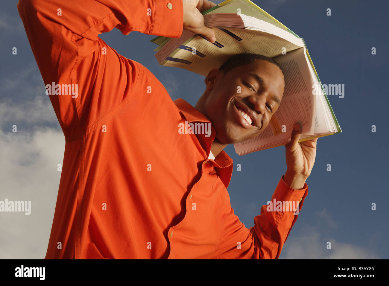 Book over the head hi-res stock photography and images - Alamy