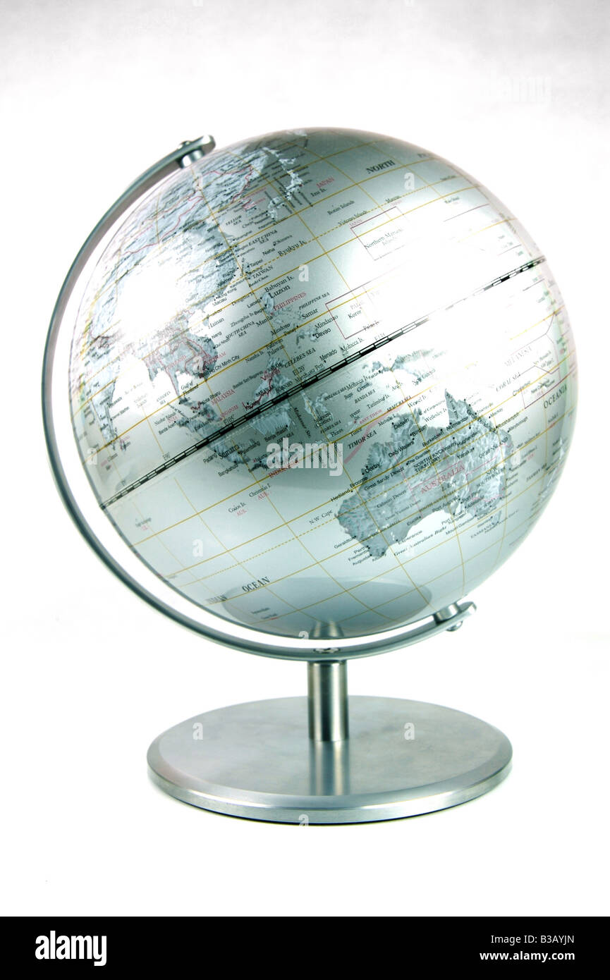 A world globe isolated against a green background Stock Photo - Alamy
