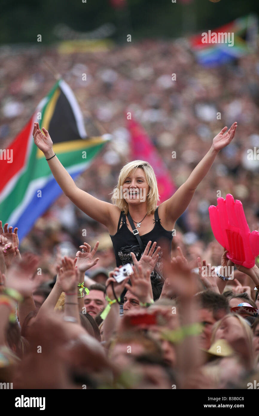 Pretty blonde girl in crowd hi-res stock photography and images - Alamy