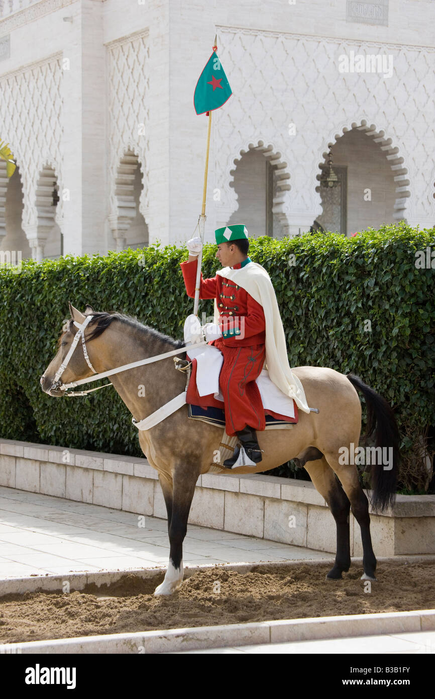 A royal guard stands at the entrance to the Mausoleum of Mohammed V in ...