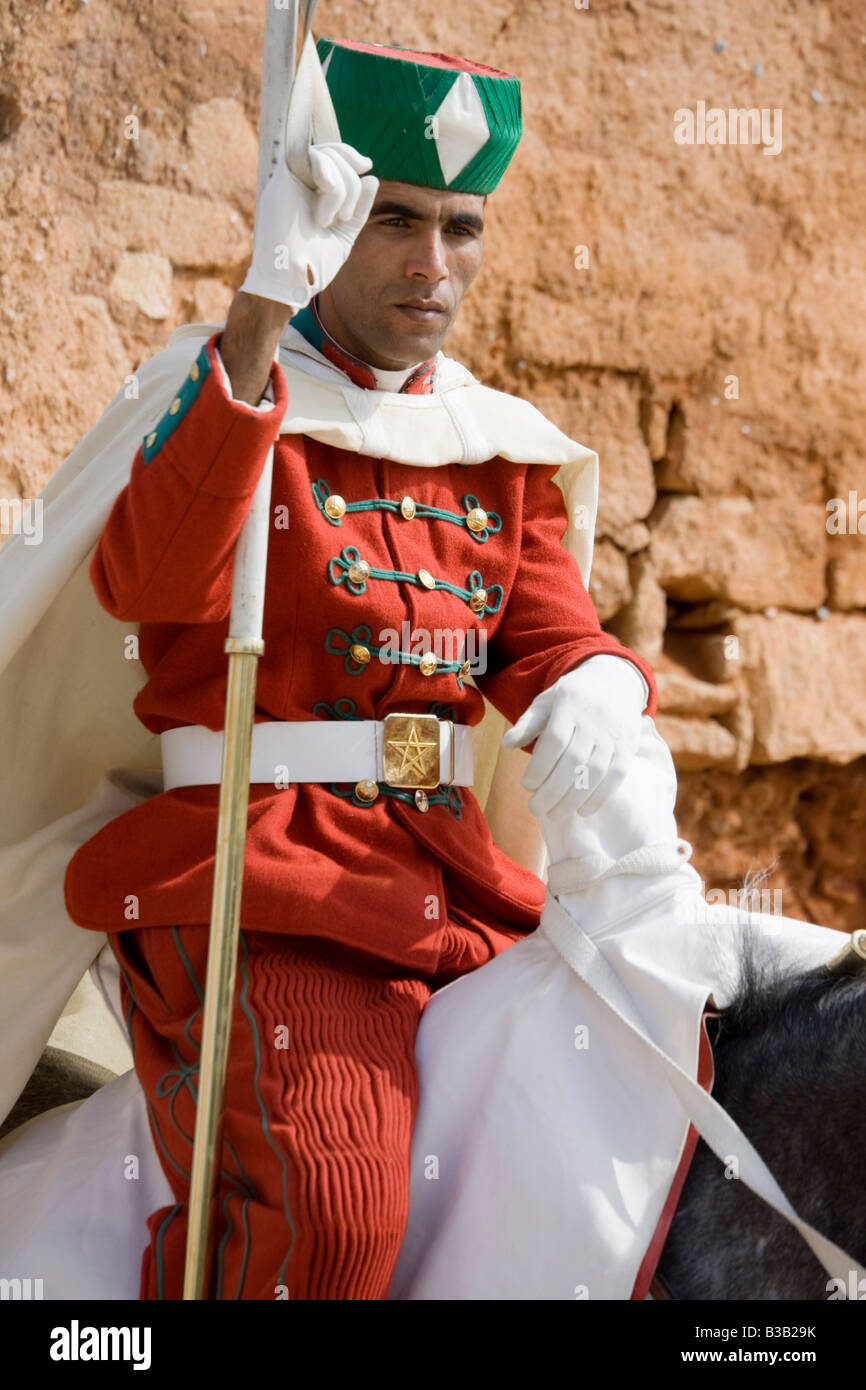A royal guard stands at the entrance to the Mausoleum of Mohammed V in ...