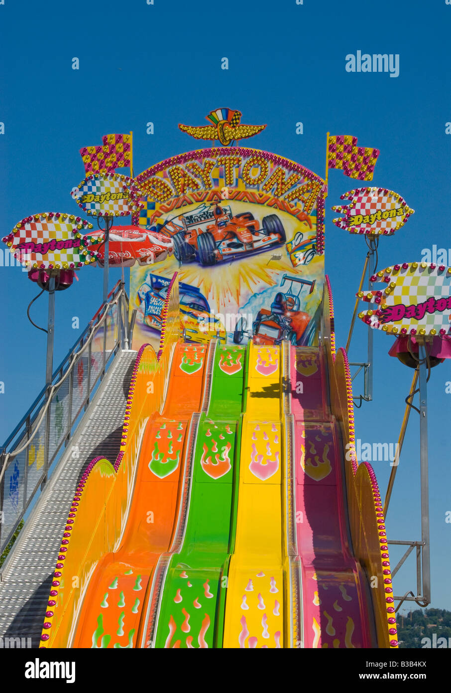 Slides at a fun fair Stock Photo - Alamy