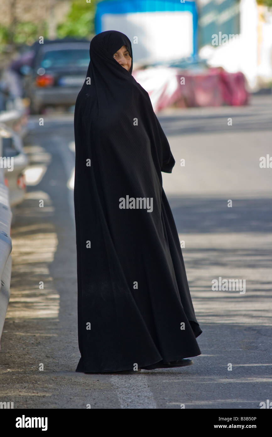 Woman wearing black chador hi-res stock photography and images - Alamy