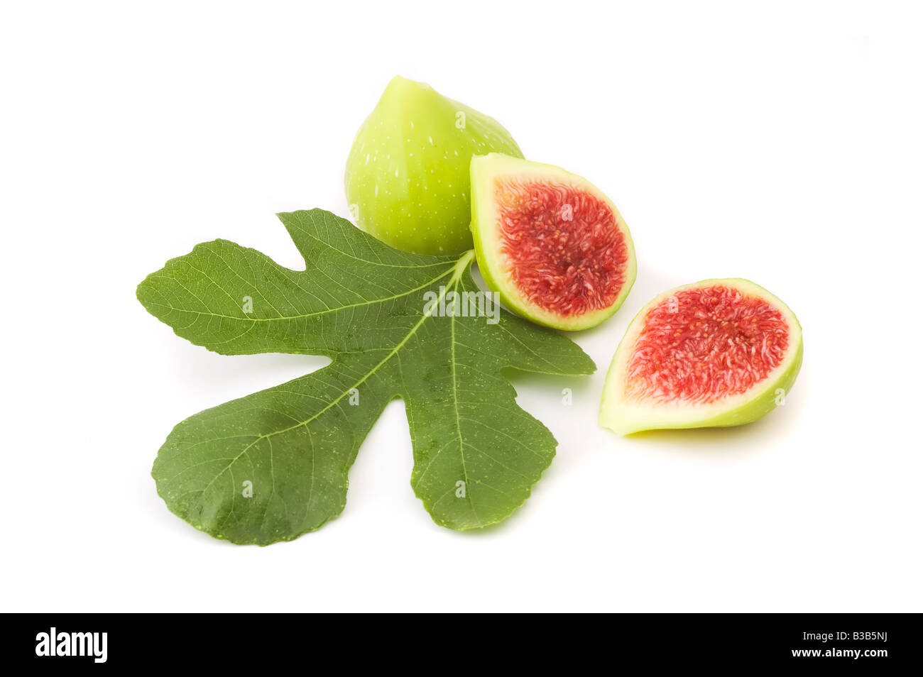 Fresh and ripe green figs with leaf isolated on white background Stock ...