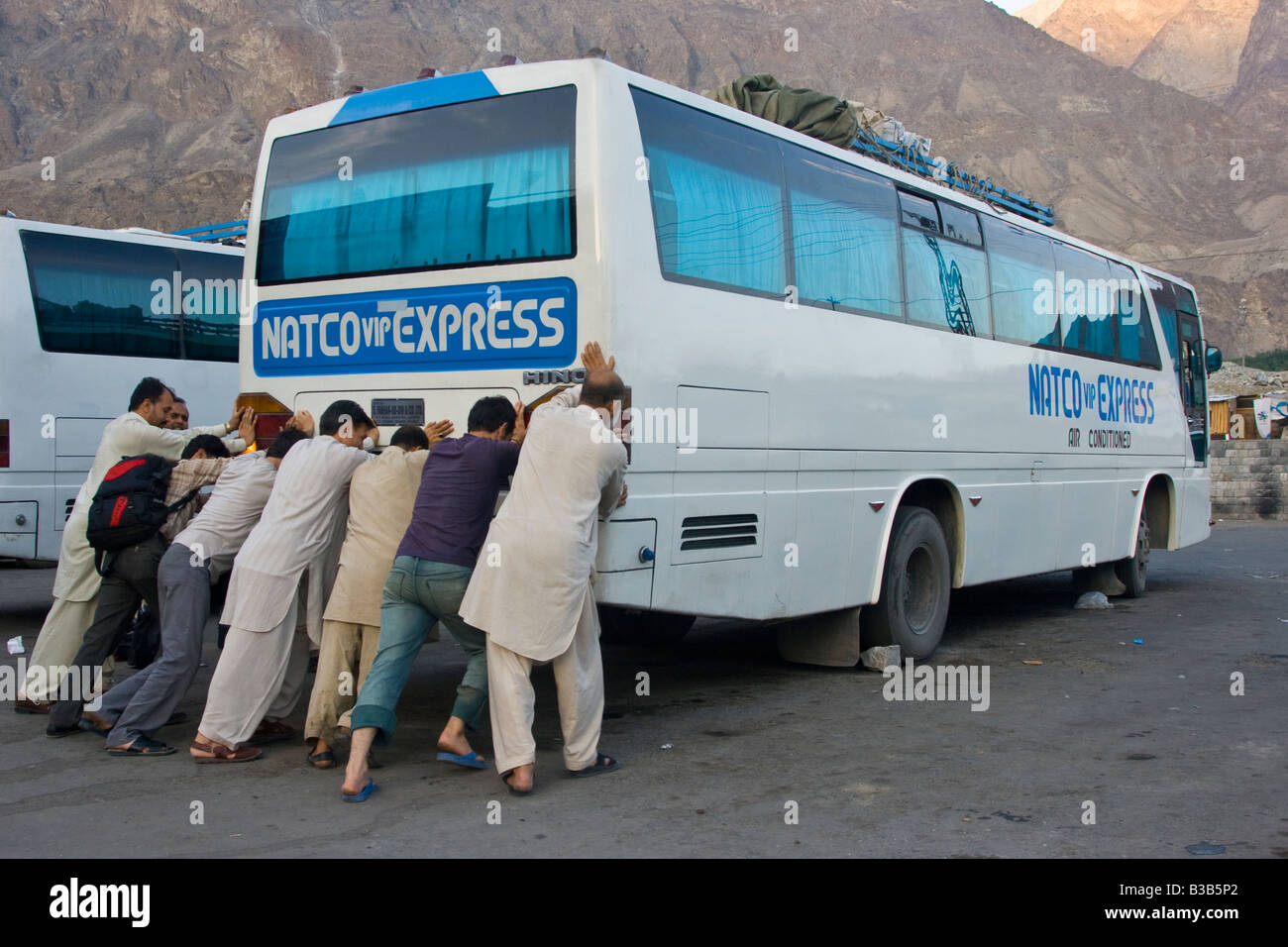 Passengers pushing bus hi-res stock photography and images - Alamy