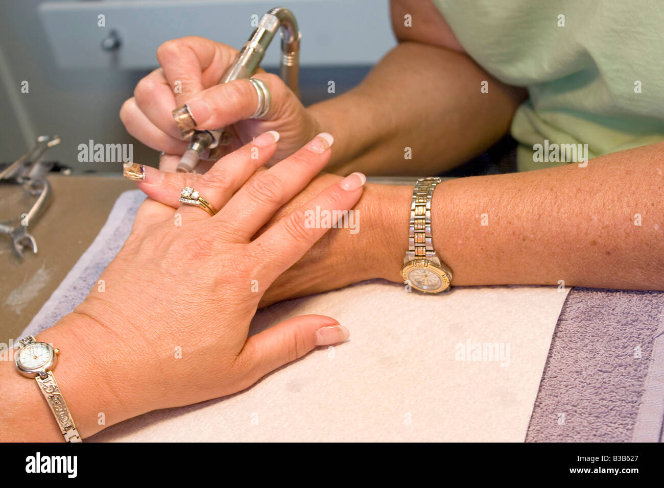 Nail technician working hi-res stock photography and images - Alamy