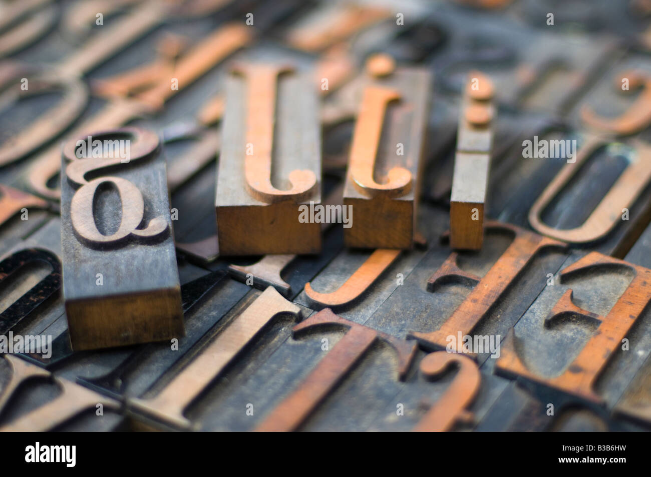 A selection of old wooden letterpress printing block letters Stock ...