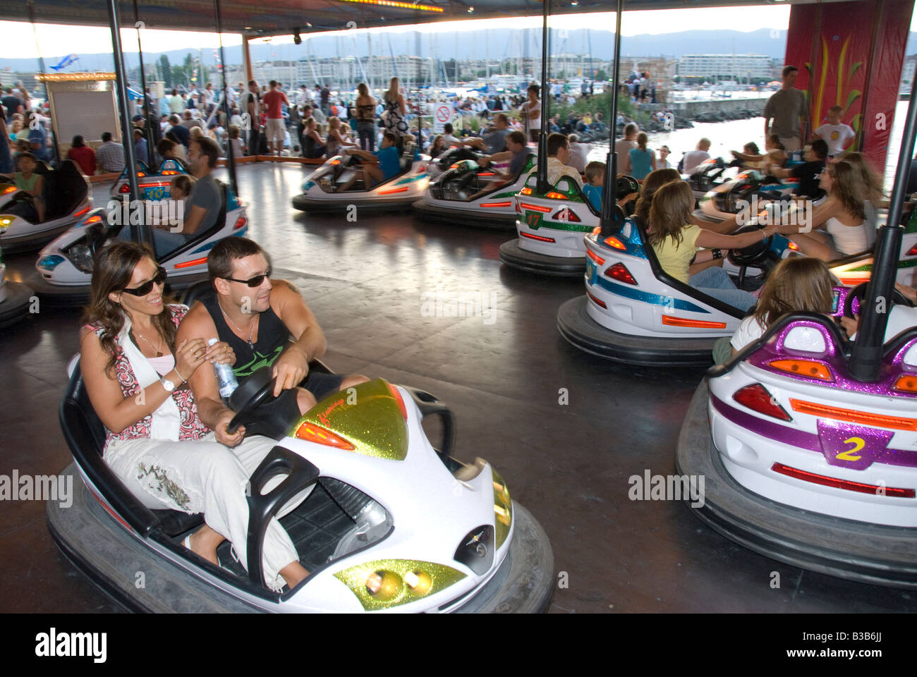 People on dodgem cars Stock Photo - Alamy