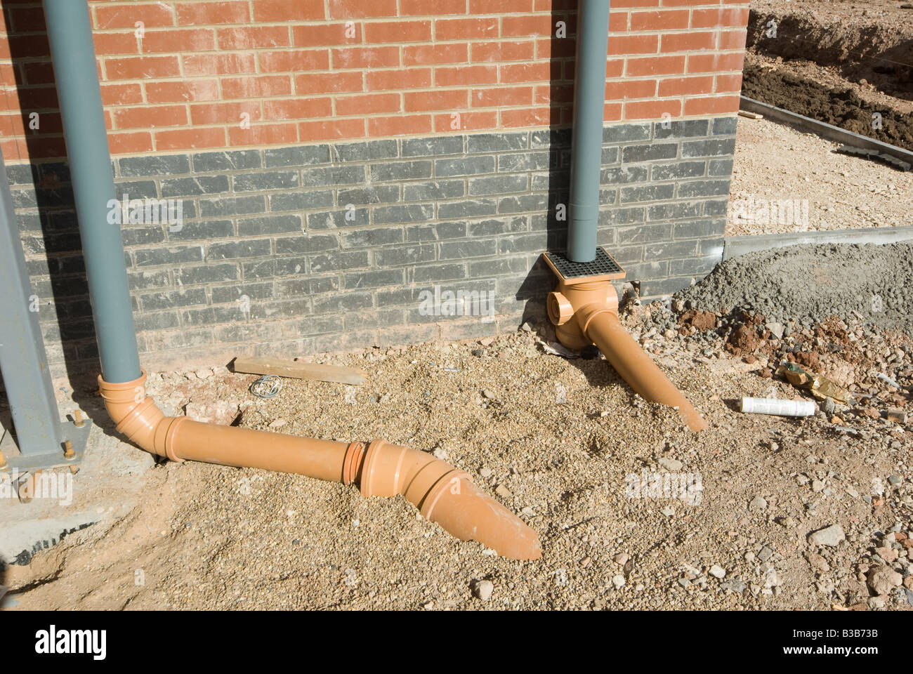 drainage pipework on a newly constructed building in the uk Stock Photo ...