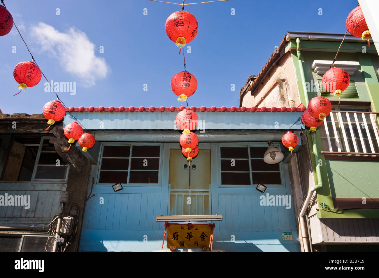 Traditional old-style Asian architecture two-story building with red ...