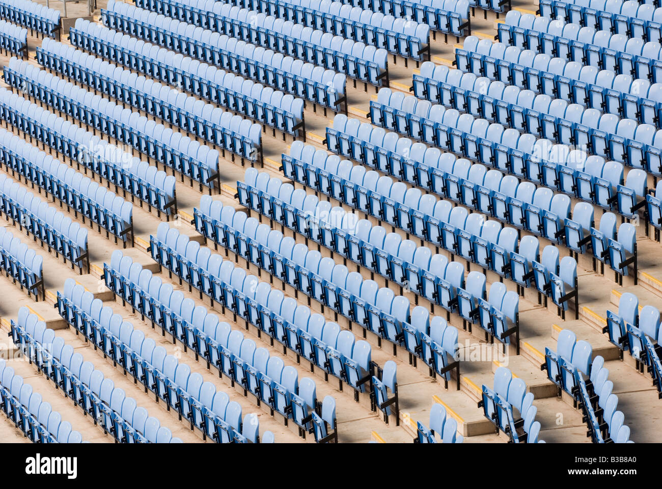 rows of empty seats at a football stadium in the uk Stock Photo - Alamy