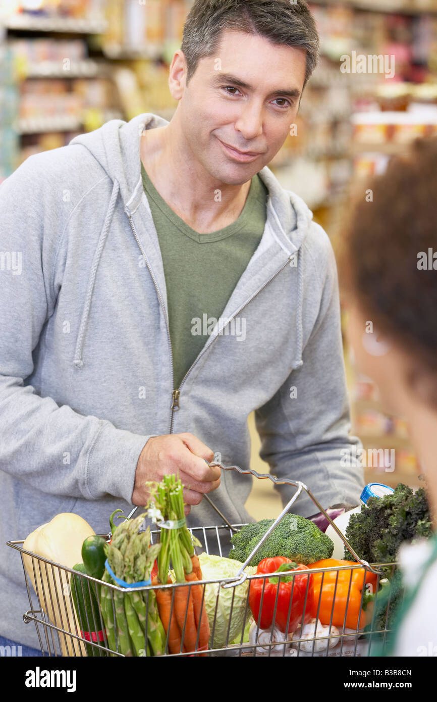 Checking out grocery store hi-res stock photography and images - Alamy