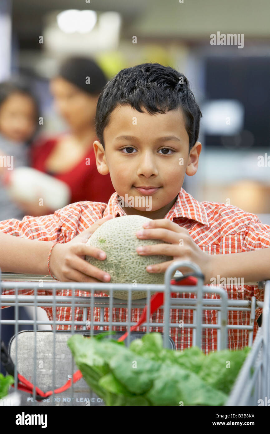 Boy squeezing fruit hi-res stock photography and images - Alamy