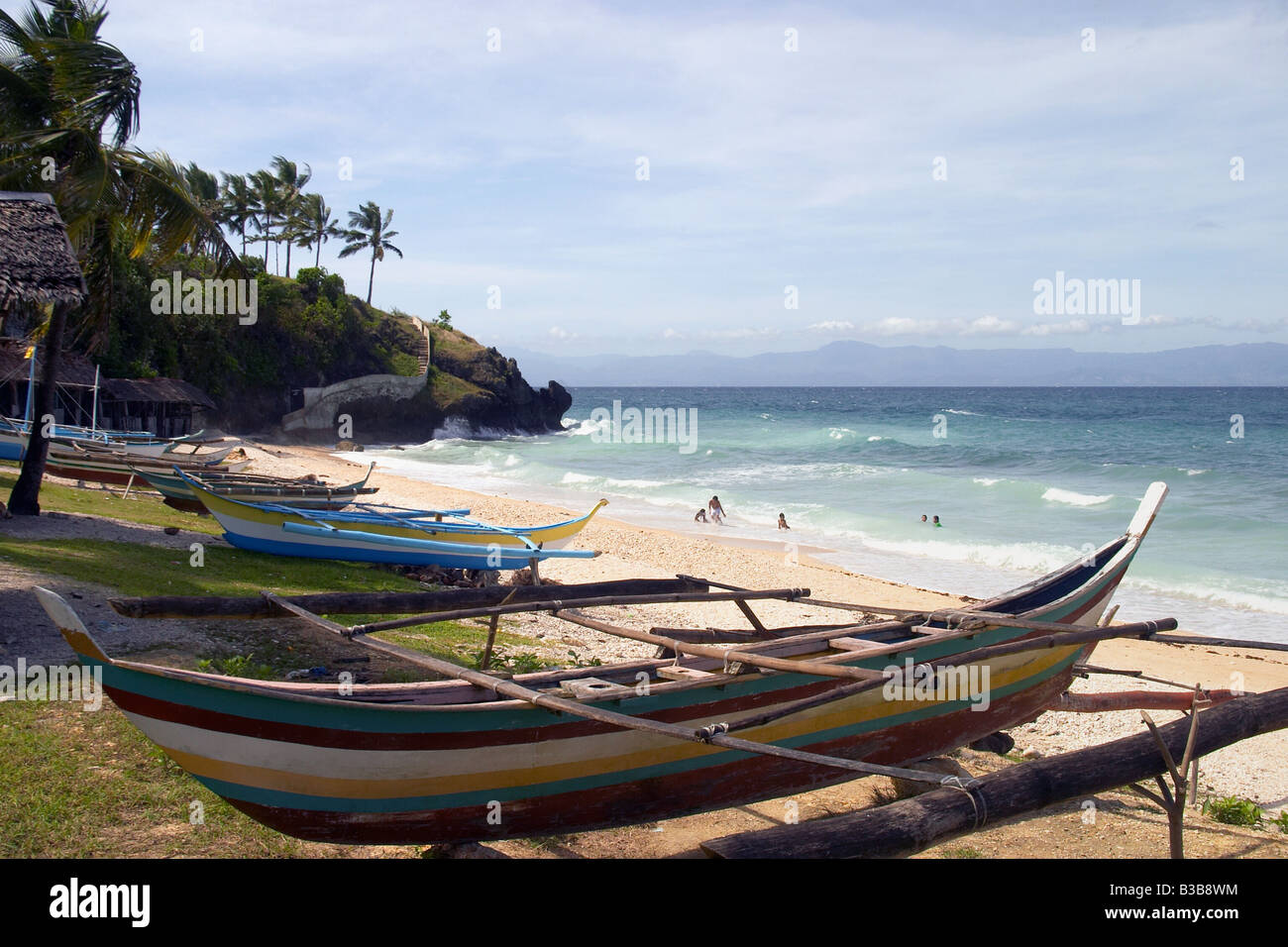 Filipino fishing boats on Barili Beach a west coast beach on Cebu Stock ...
