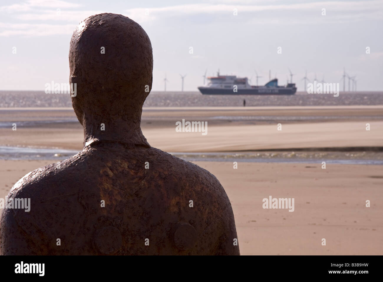 One of Antony Gormley's cast iron statues as part of his installation ...