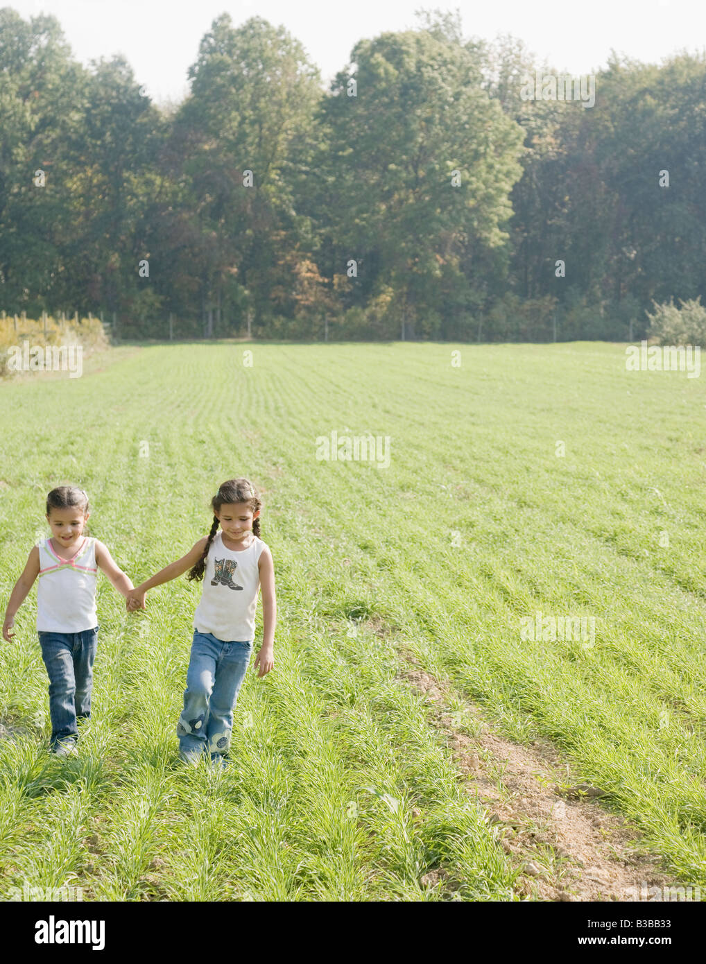 Sisters Holding Hands High Resolution Stock Photography and Images - Alamy