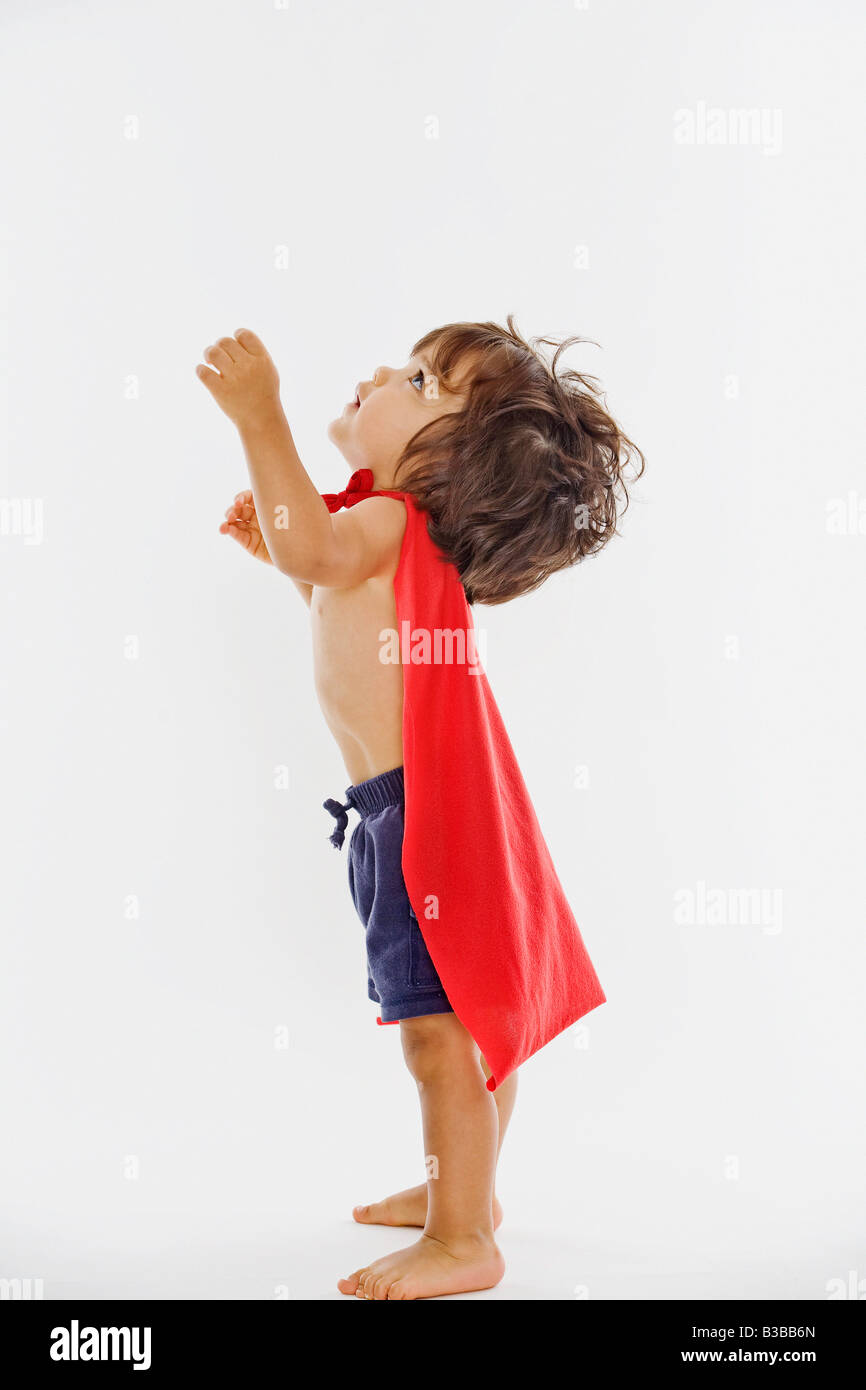 Little Boy Wearing Red Cape Stock Photo - Alamy