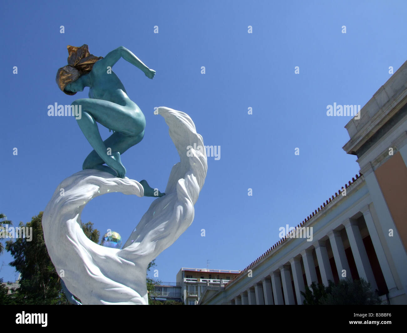 artwork statue by the national museum in athens greece Stock Photo - Alamy