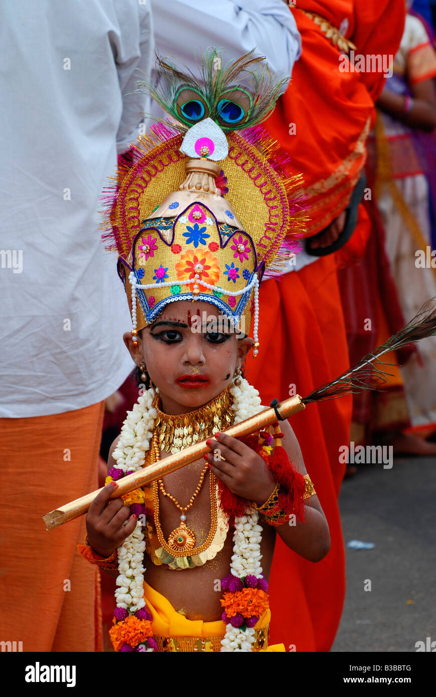 Little Krishna- a small boy posing as lord krishna in a balagokulam ...