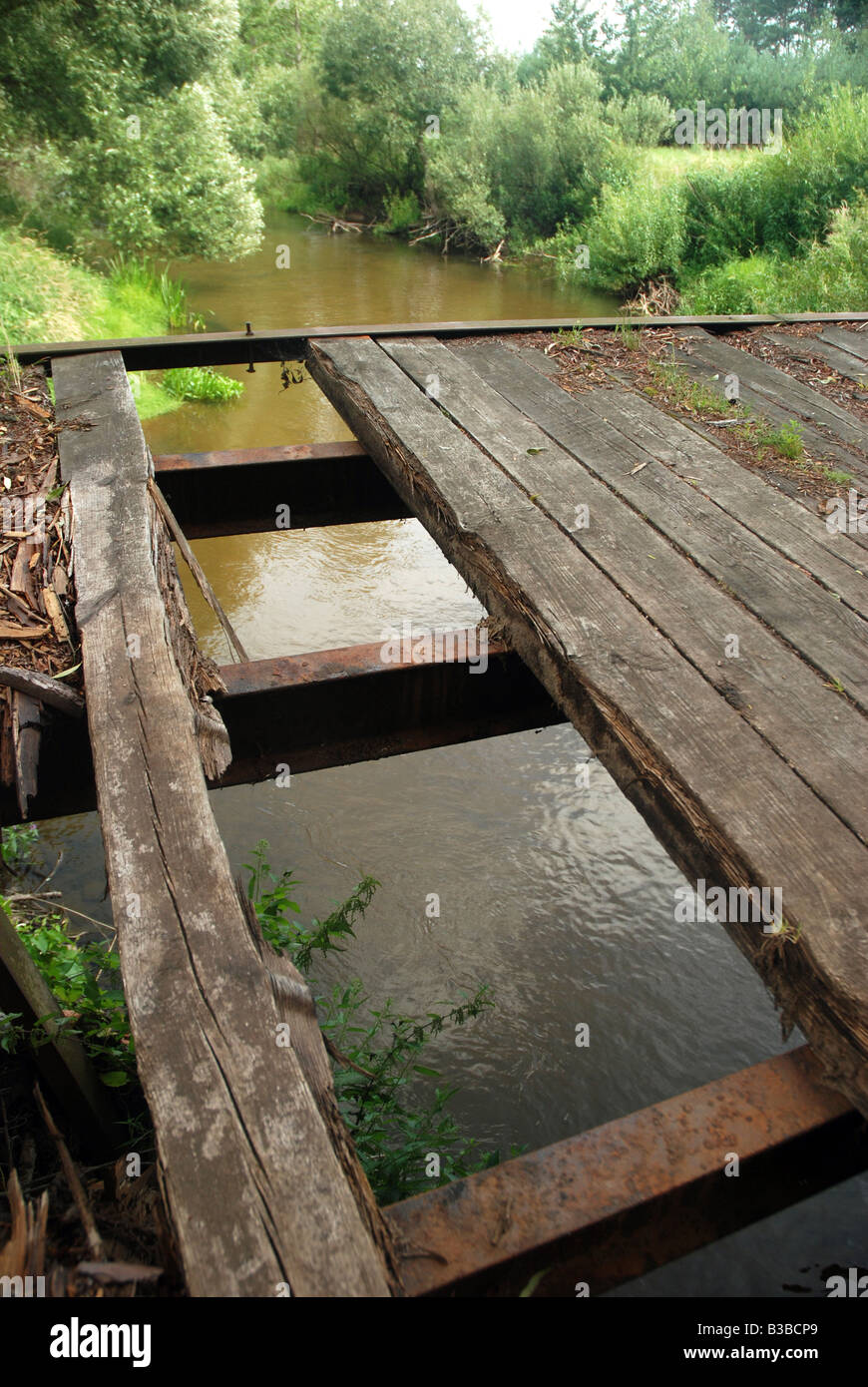 Old wooden bridge over Liwiec river in Poland Stock Photo - Alamy
