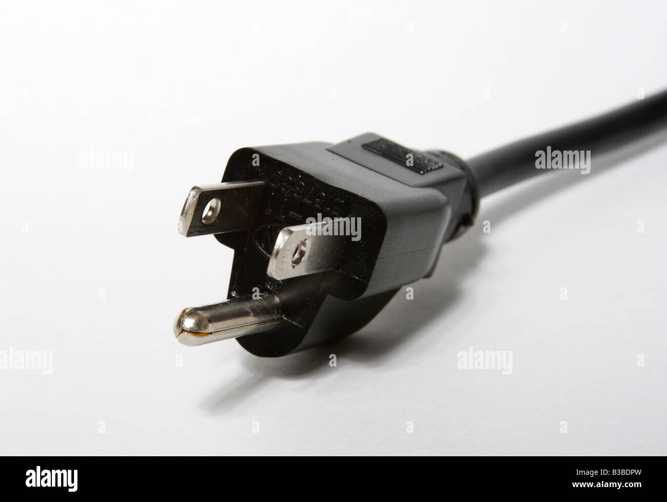 A 115 volt computer power cord is shown on a white background Stock ...