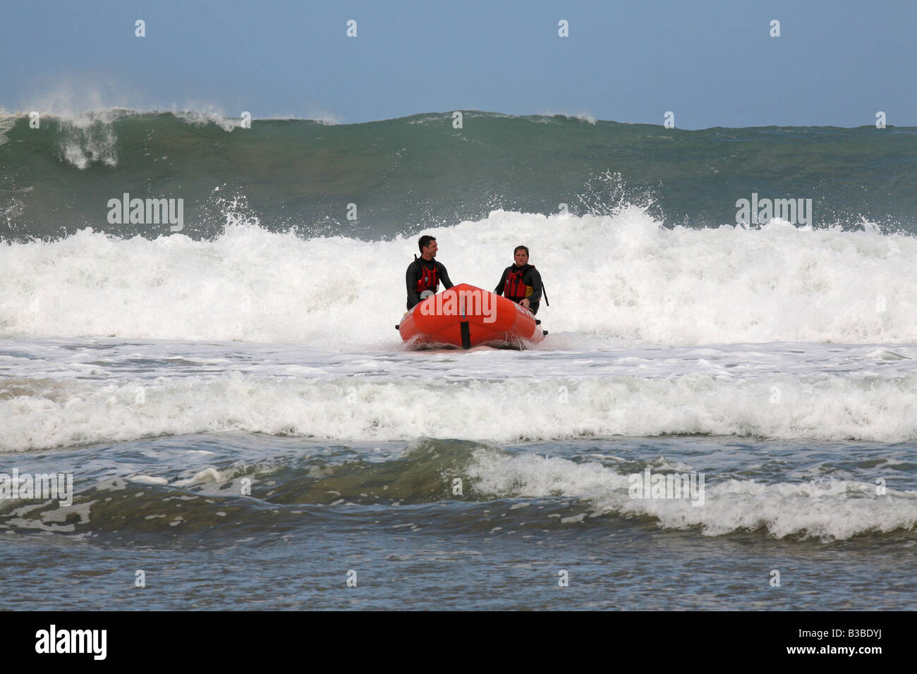 RNLI Lifeguards in a rescue boat in rough seas off St Agnes, Cornwall ...