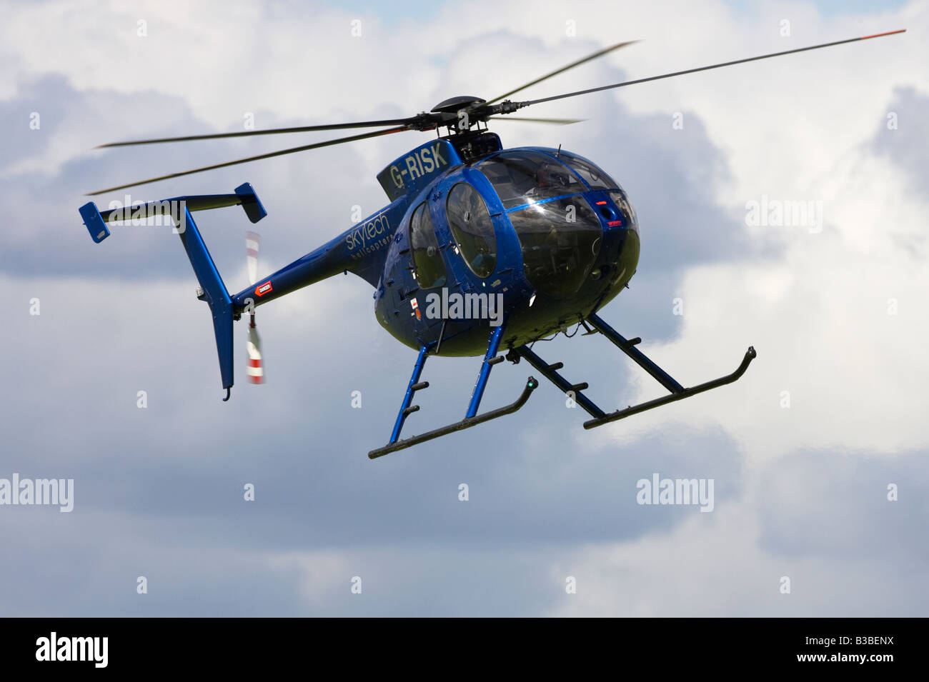 Hughes 369E G-RSIK helicopter Stock Photo - Alamy