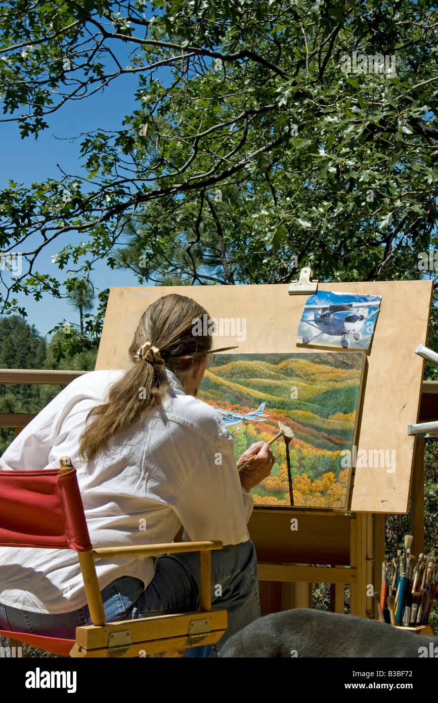 Painter works on her newest painting Stock Photo - Alamy