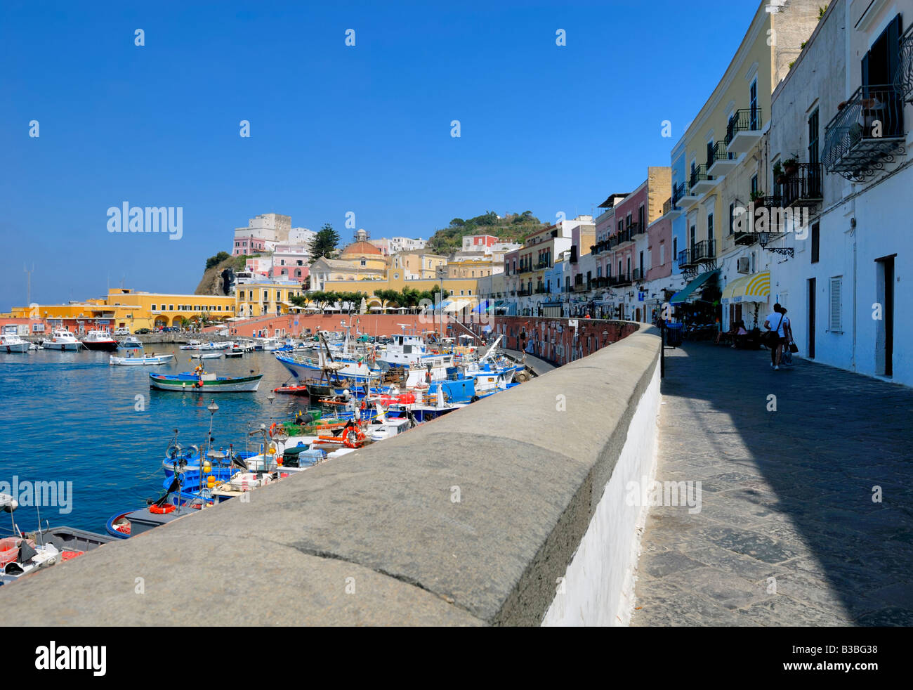A fine view to Ponza harbour, a crystal water and the typical colorful ...