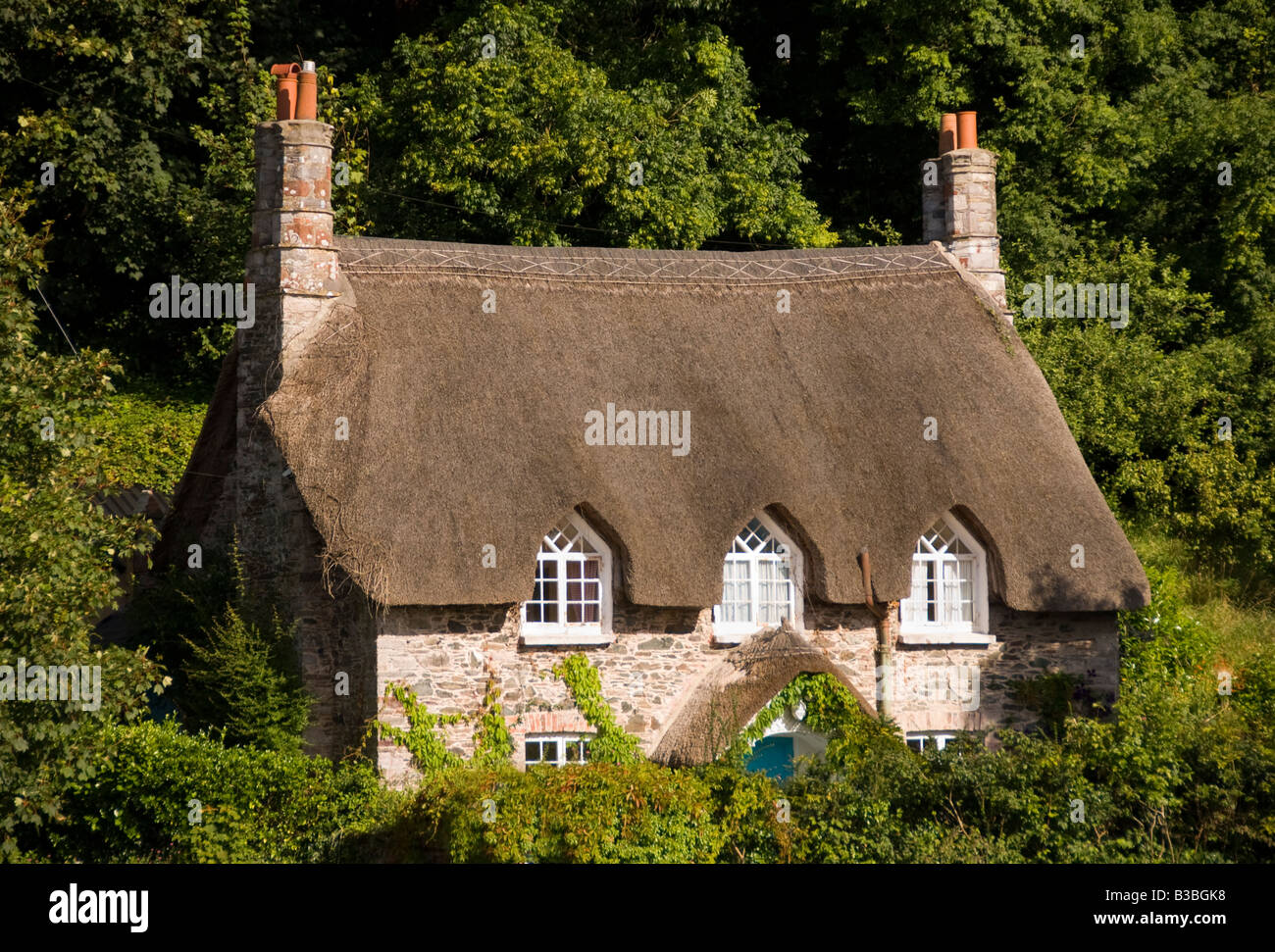 The thatched cottage at Greenway Quay in Devon Stock Photo - Alamy