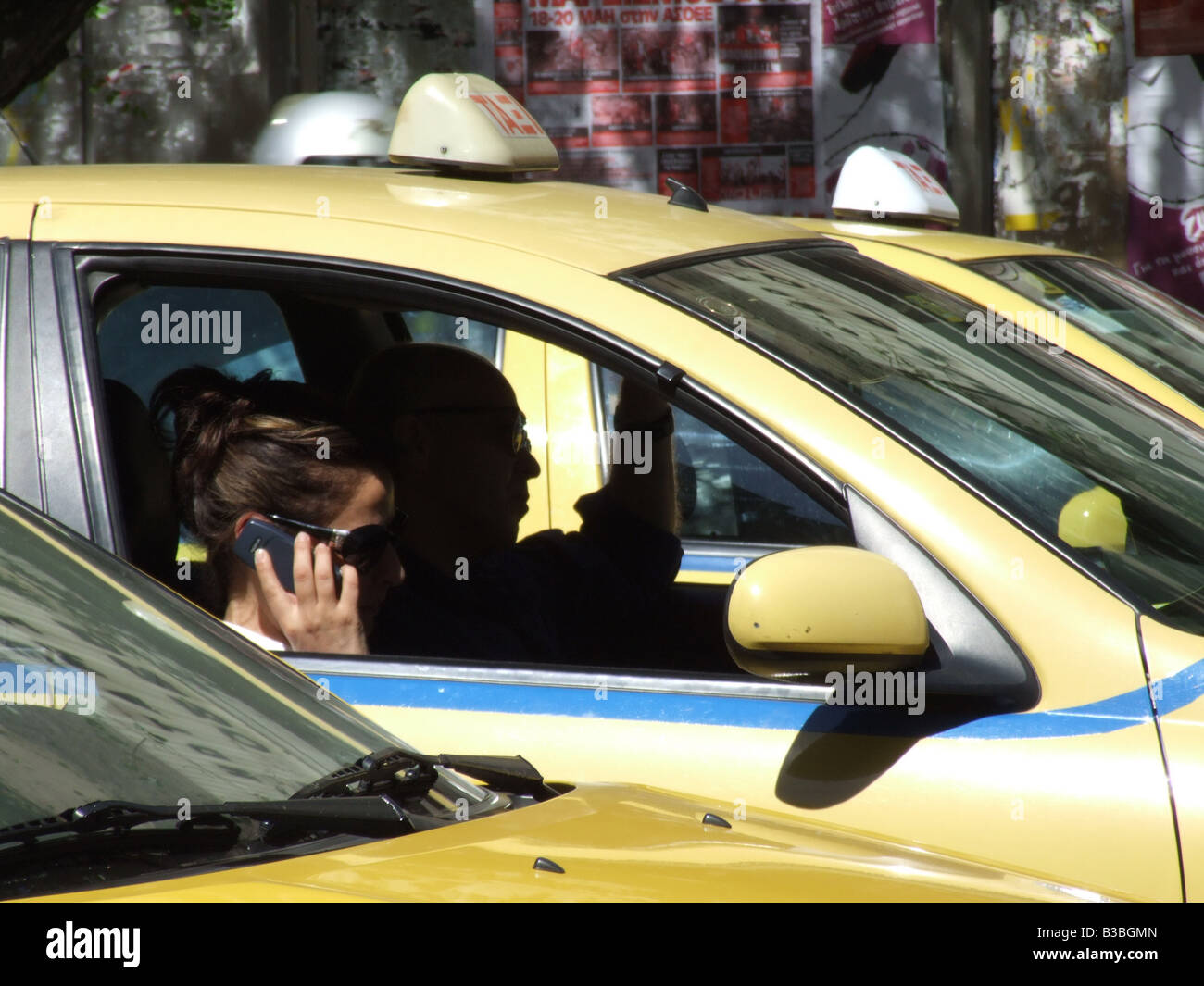 yellow taxi cab in athens, greece Stock Photo - Alamy