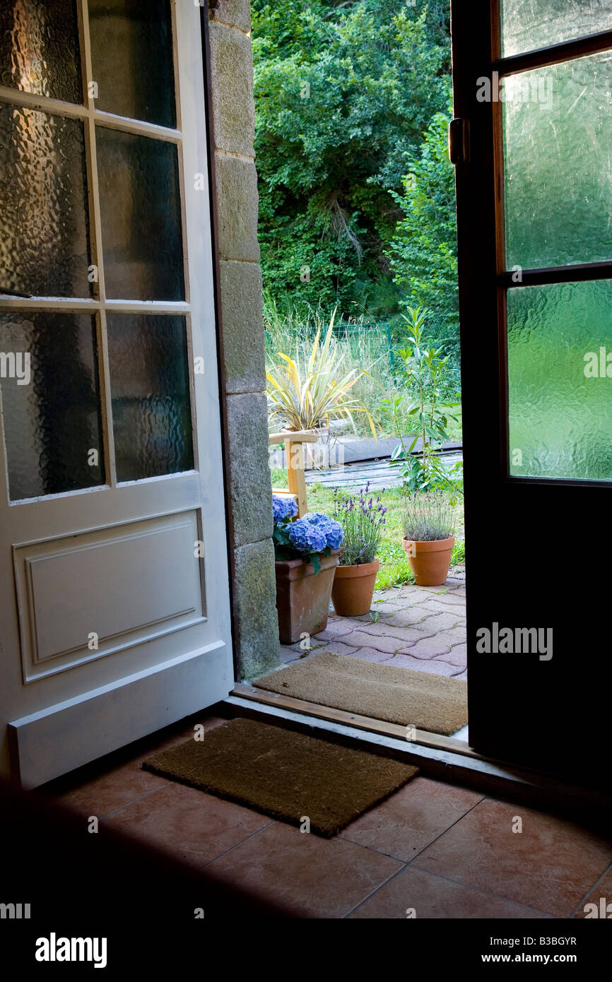tranquil view looking out of door onto garden Stock Photo - Alamy