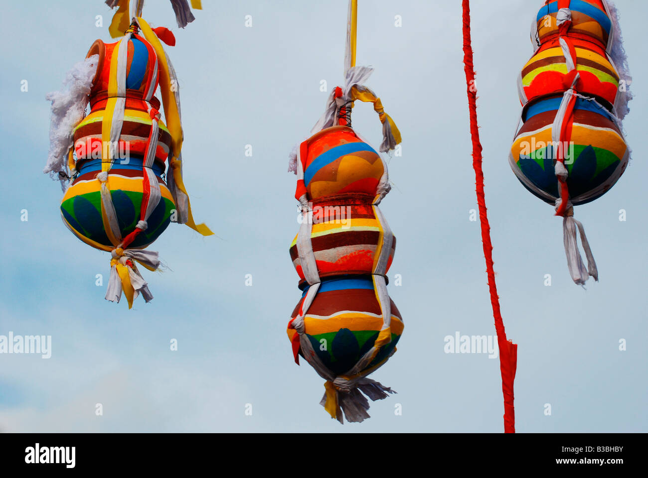 Hanging coloured pots to be used for breaking them by Hindus in India ...