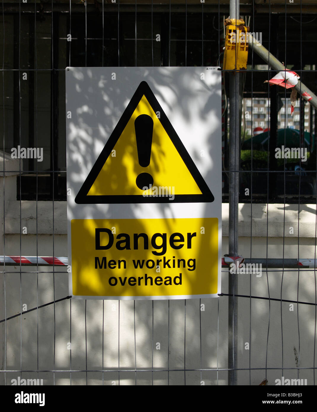 Caution men working overhead hi-res stock photography and images - Alamy