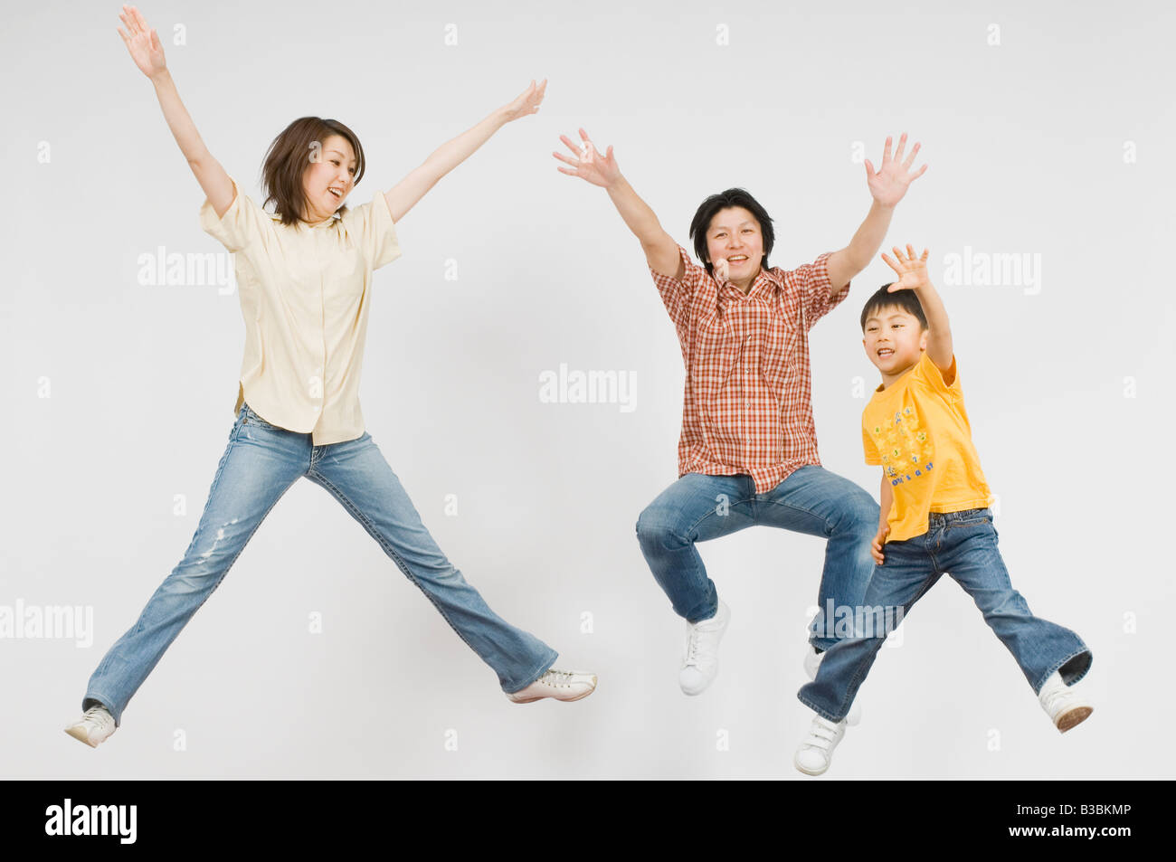 Boy jumping up black hi-res stock photography and images - Alamy