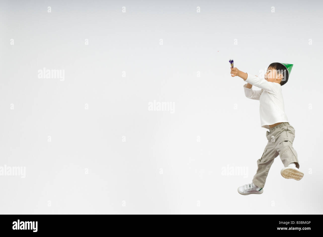 Boy holding firecracker Stock Photo - Alamy