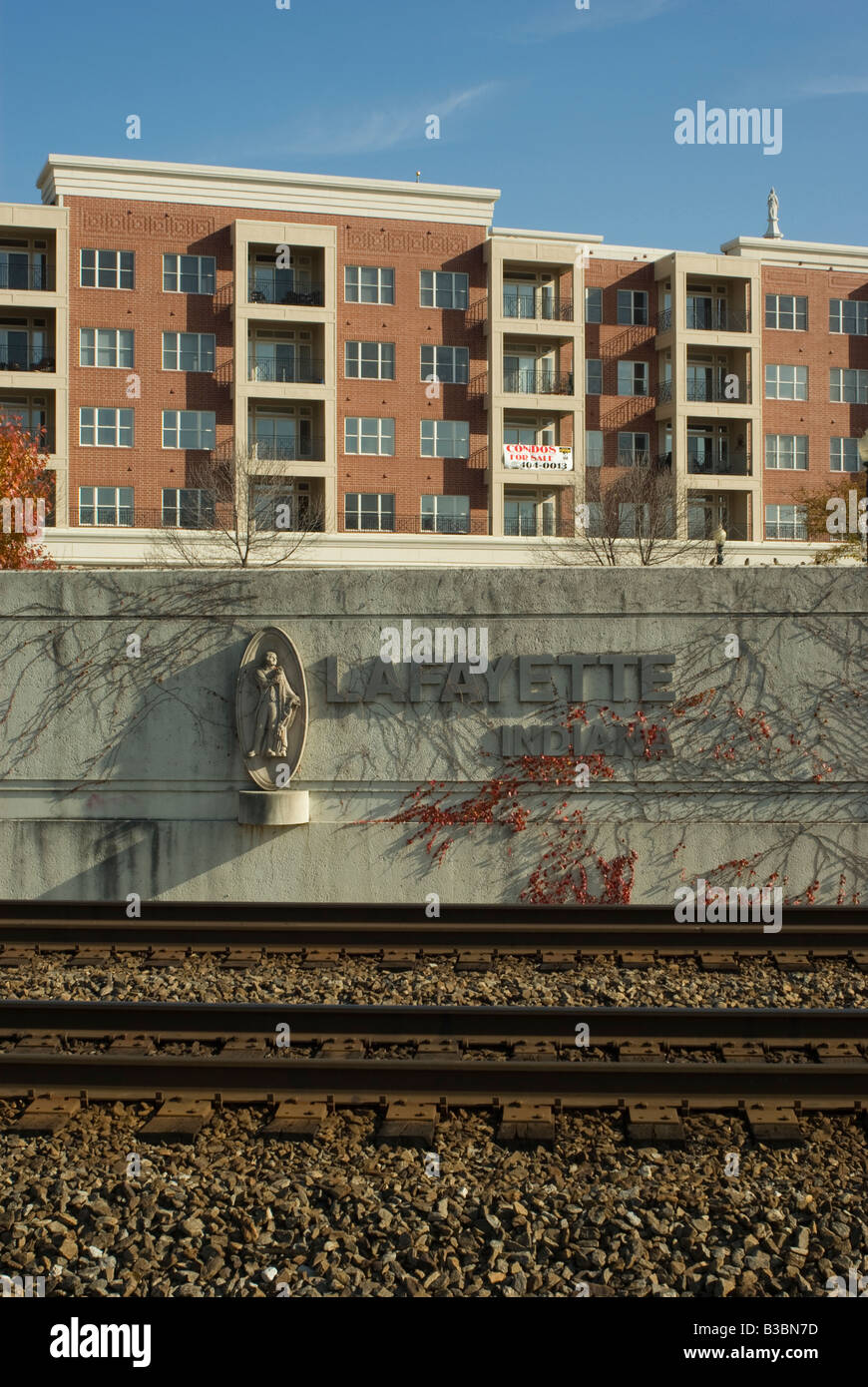 The Lafayette town sign is visible along railroad tracks with ...