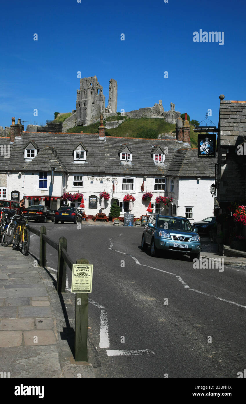 Corfe Castle - View of the ruined castle overlooking the Greyhound Inn ...