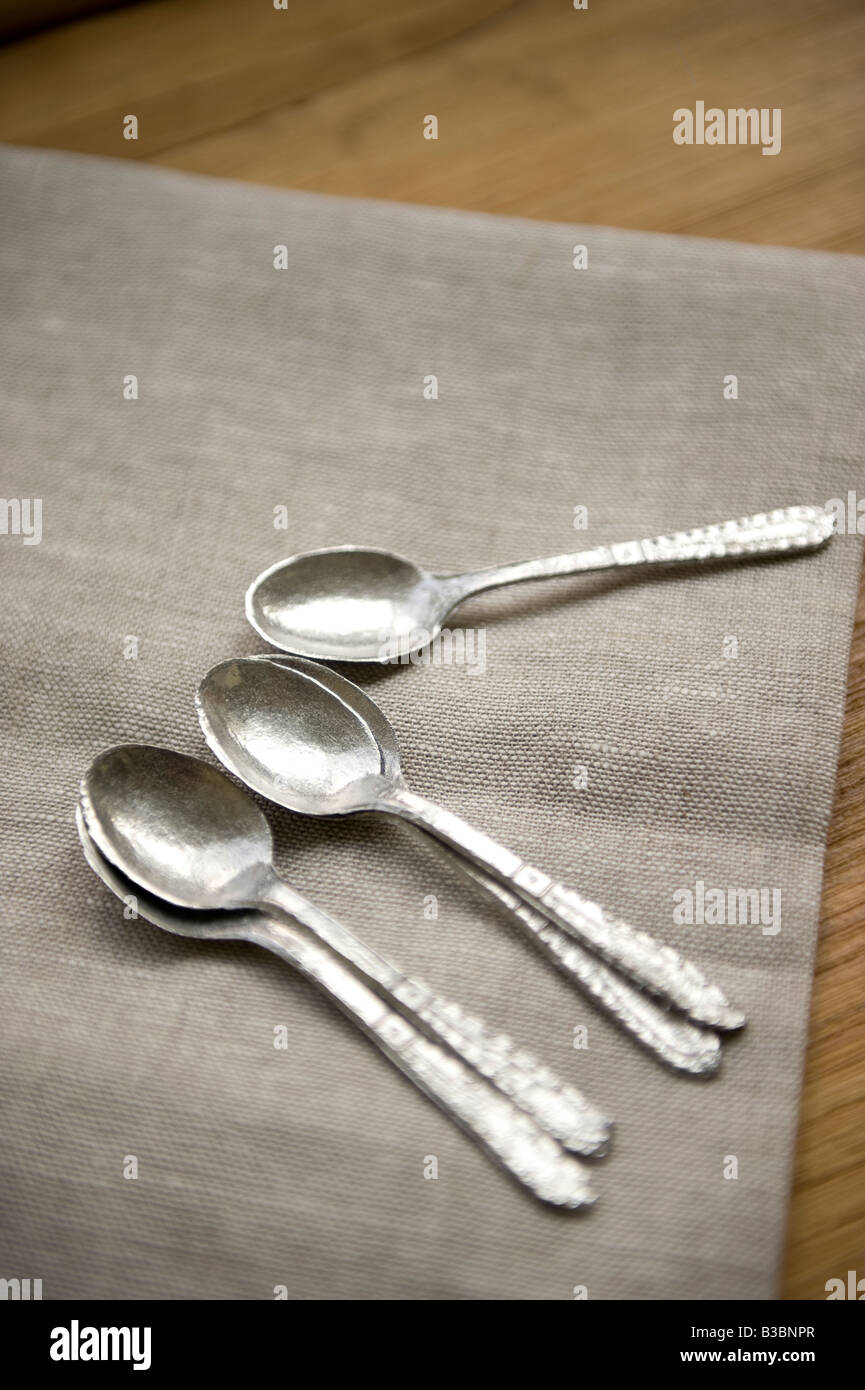 Spoons on fabric Stock Photo - Alamy