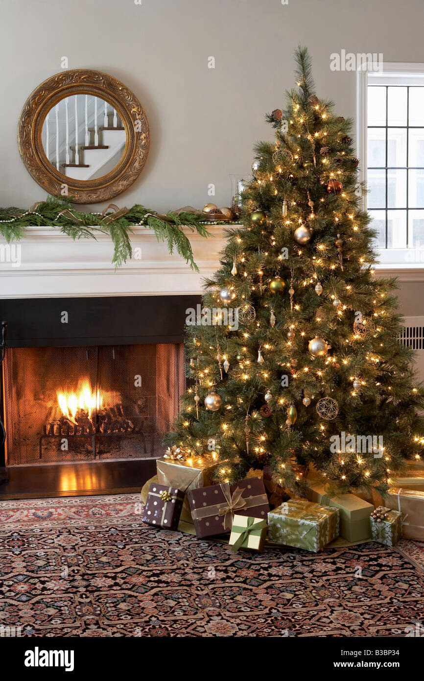 Christmas tree lit interior house hi-res stock photography and images ...