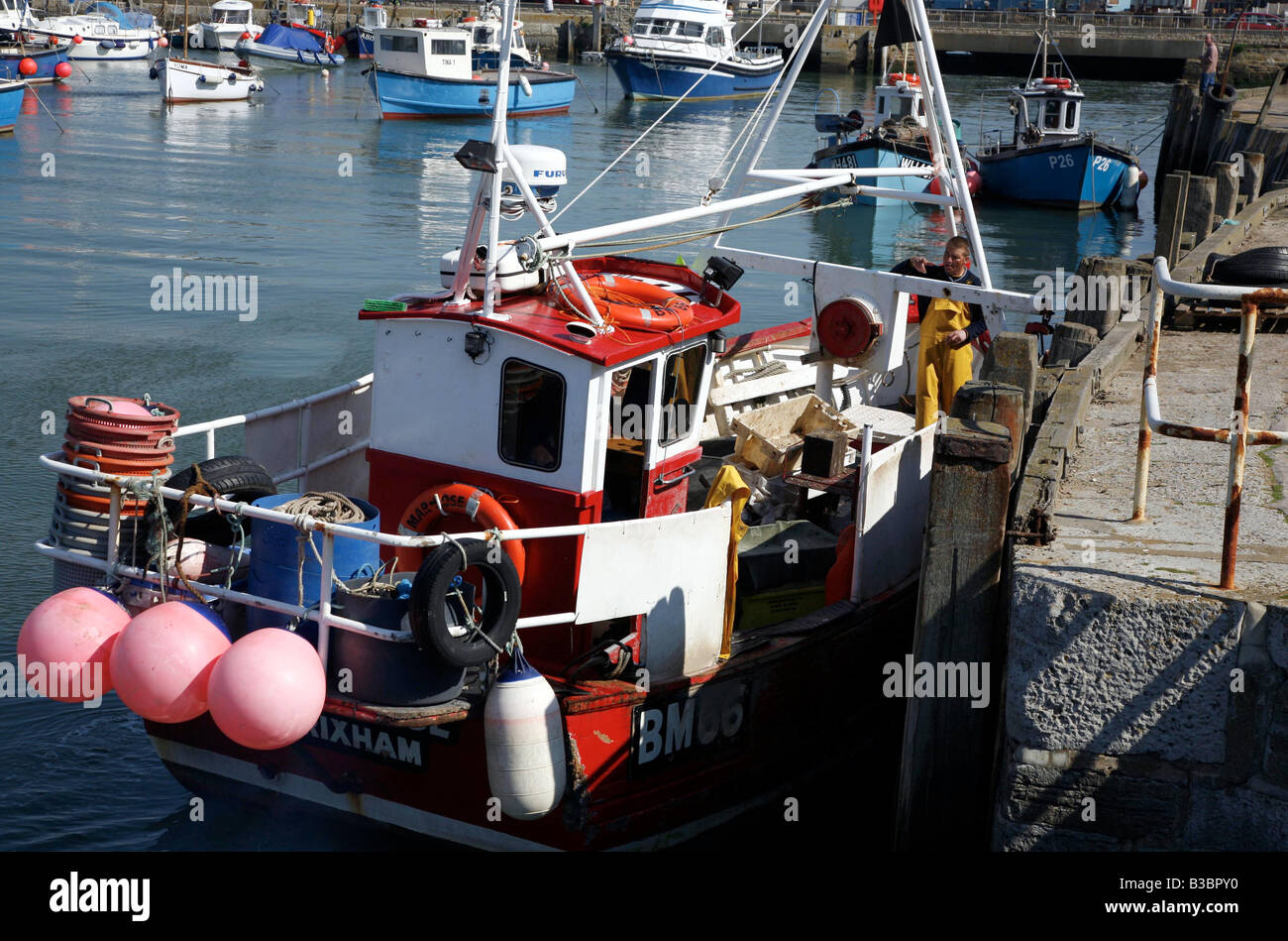 Dorset Fishing boat in West Bay harbour Stock Photo - Alamy